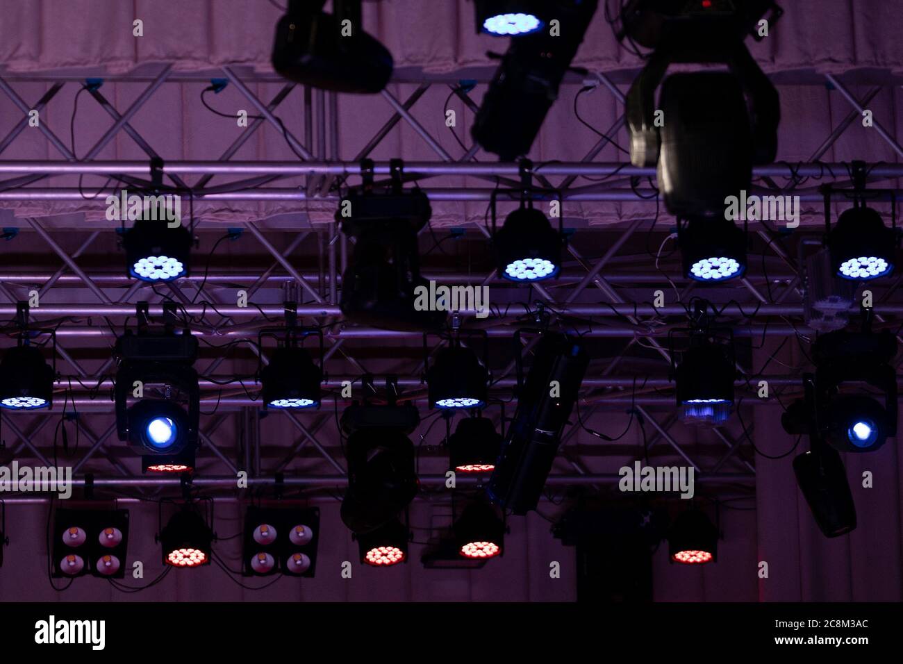 Lighting and spotlights, stage light in a theater above the stage ...