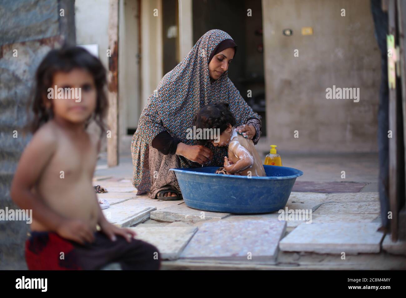 Rafah, The Gaza Strip, Palestine. 25th July, 2020. A Palestinian woman ...