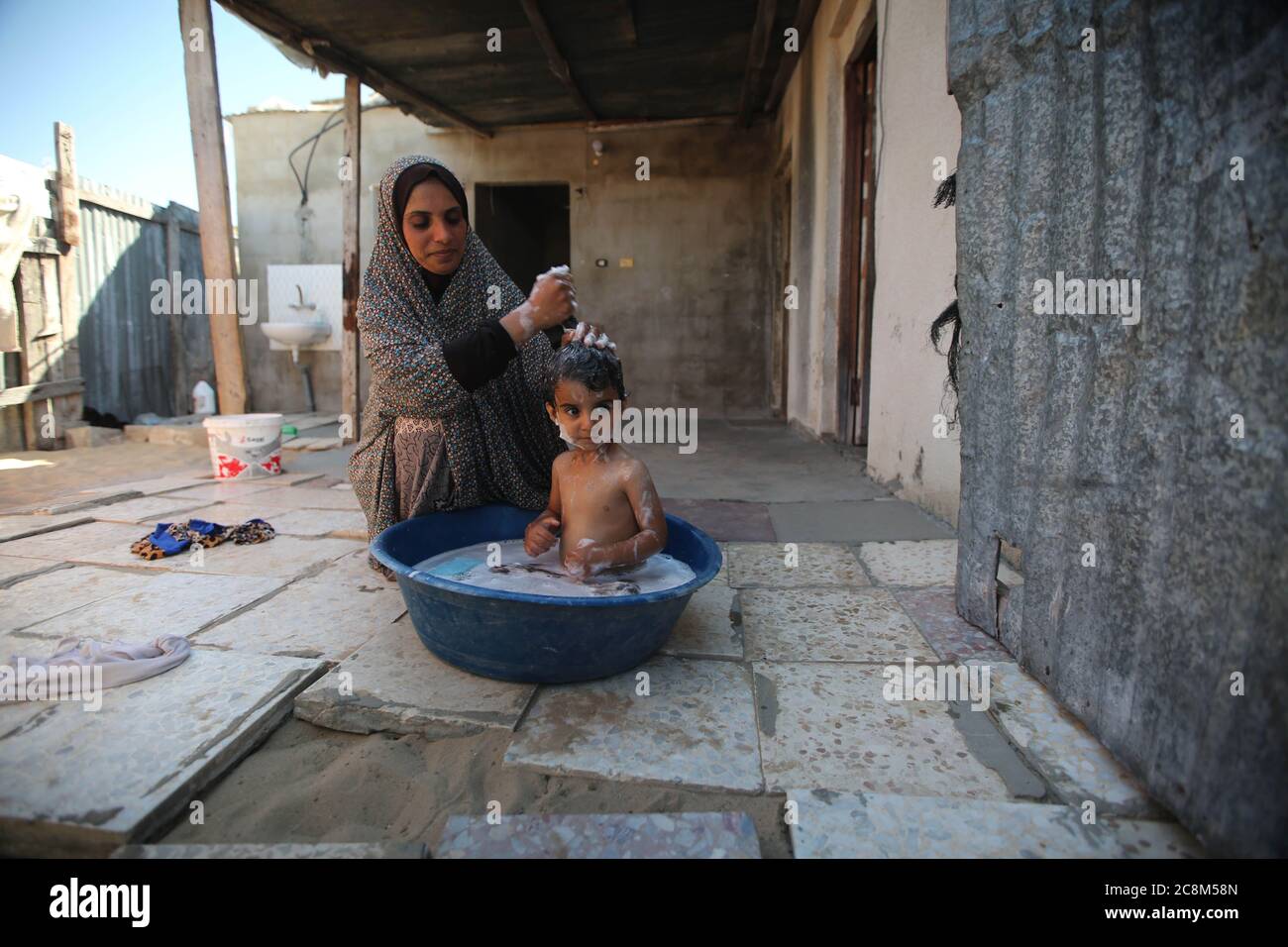 Rafah, The Gaza Strip, Palestine. 25th July, 2020. A Palestinian woman ...