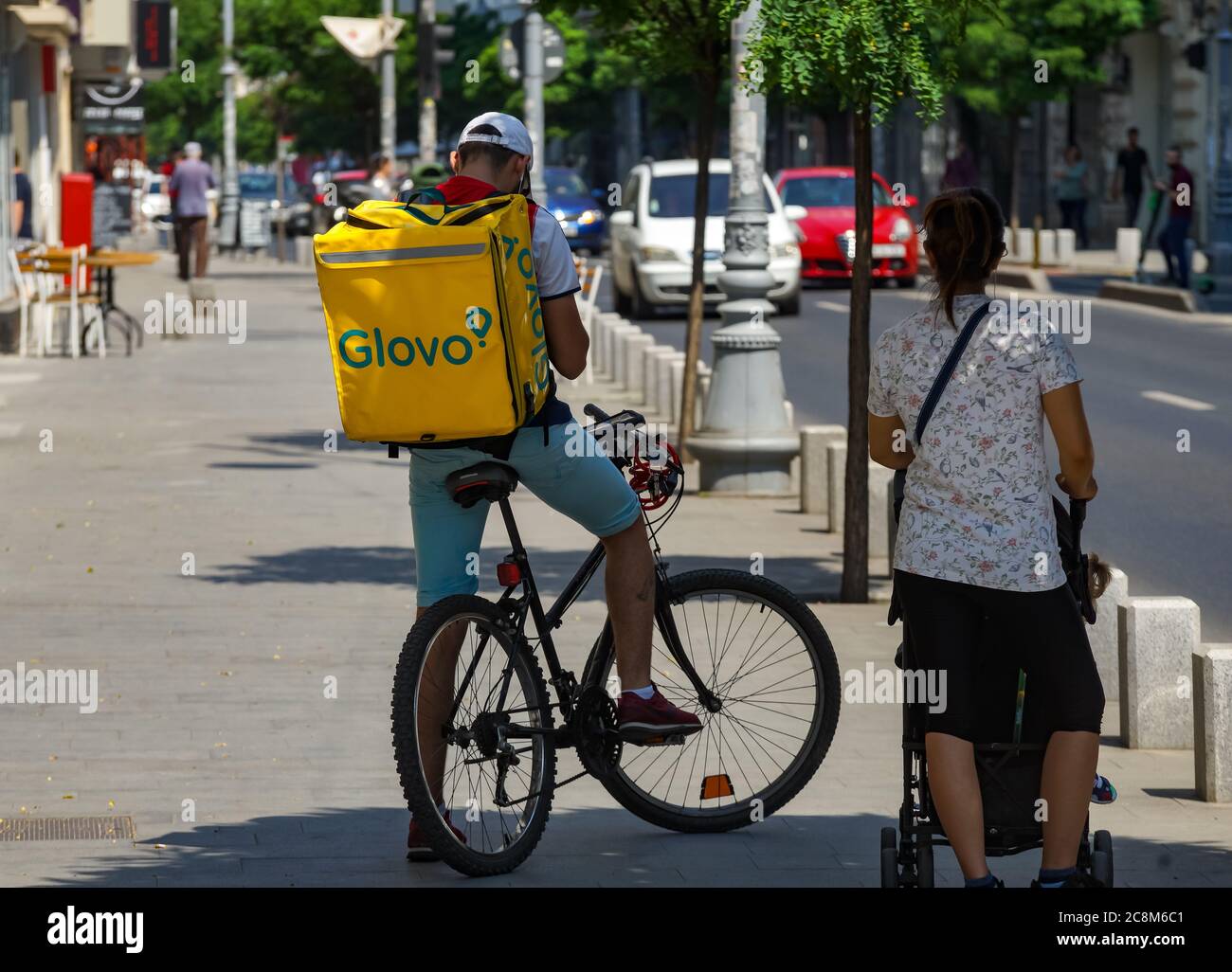 Bucharest, Romania - June 30, 2020: A Glovo food delivery courier ...
