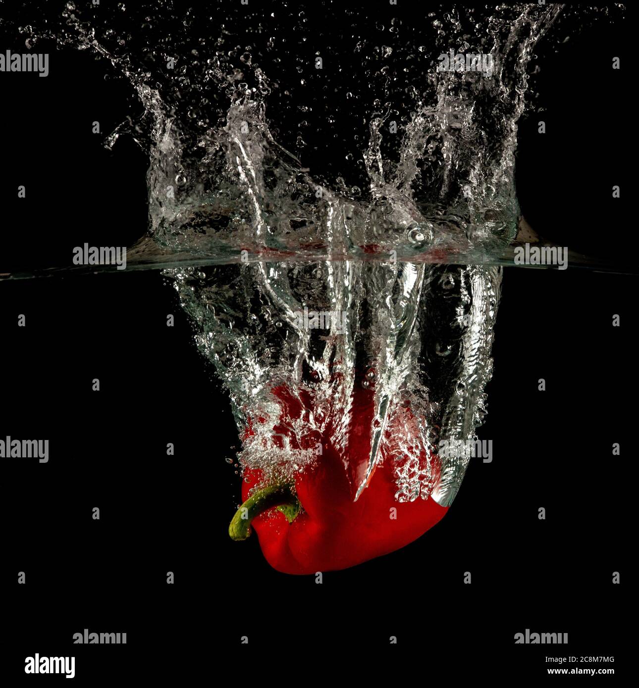 Red bell pepper splash hi-res stock photography and images - Alamy