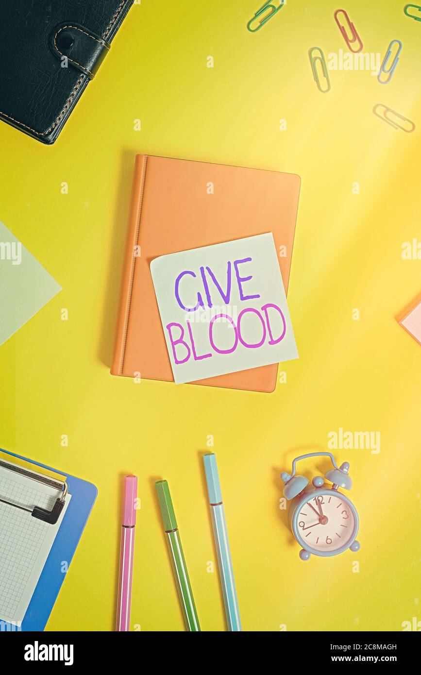 Handwriting text writing Give Blood. Conceptual photo an individual ...