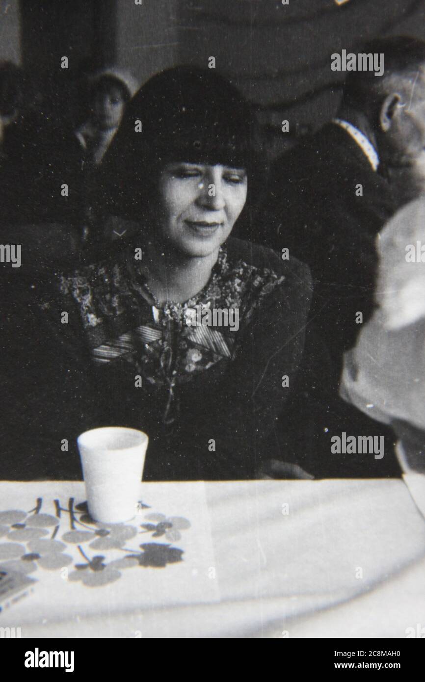 Fine 70s vintage black and white lifestyle photography of a shy and ...