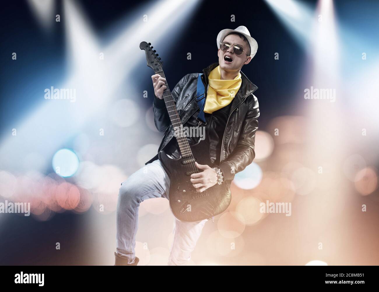 Rock star on stage Stock Photo - Alamy
