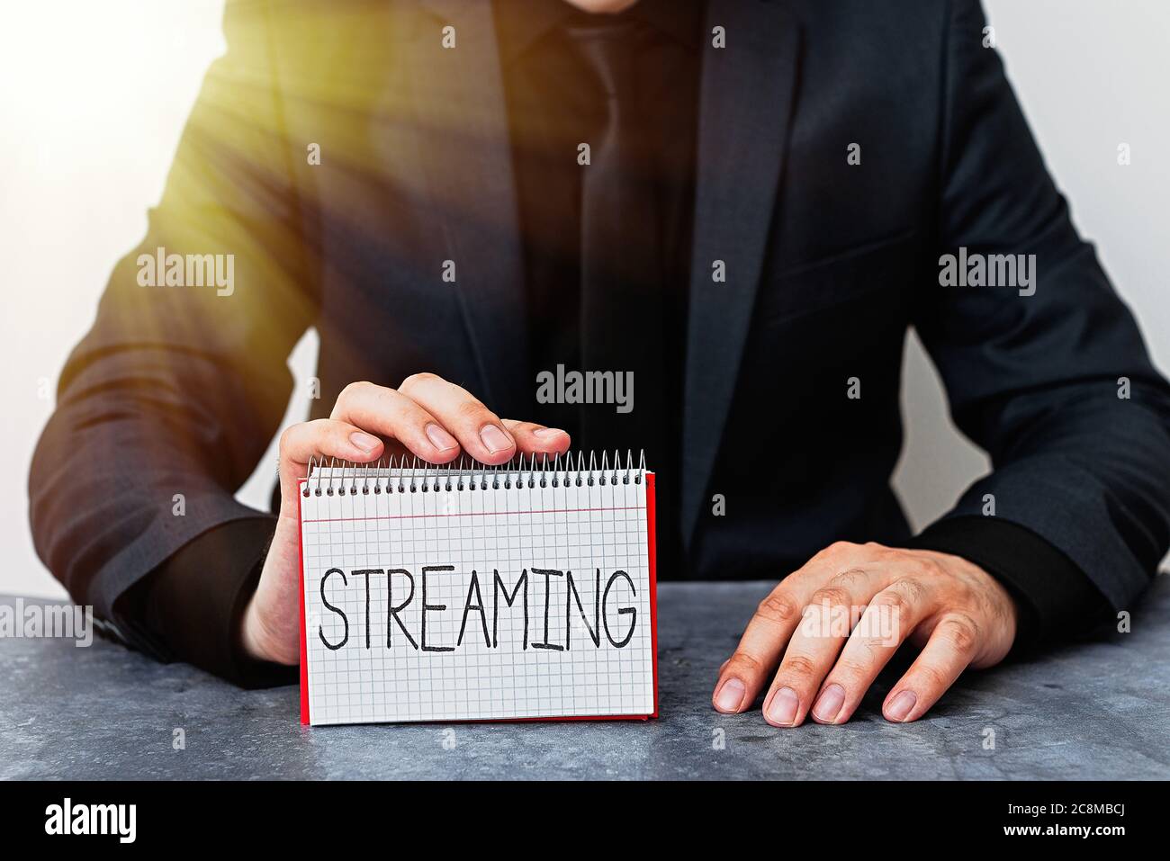 Conceptual hand writing showing Streaming. Concept meaning process, or ...