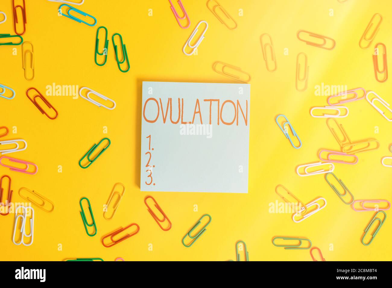 Writing note showing Ovulation. Business concept for the discharge of a ...
