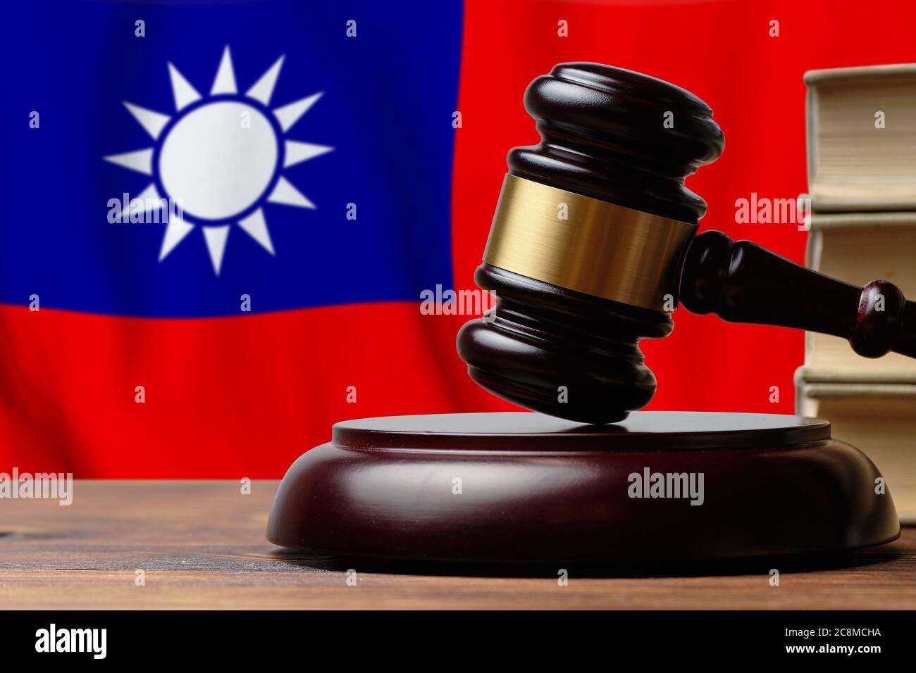 Justice and court concept in Taiwan Province. Judge hammer on a flag ...