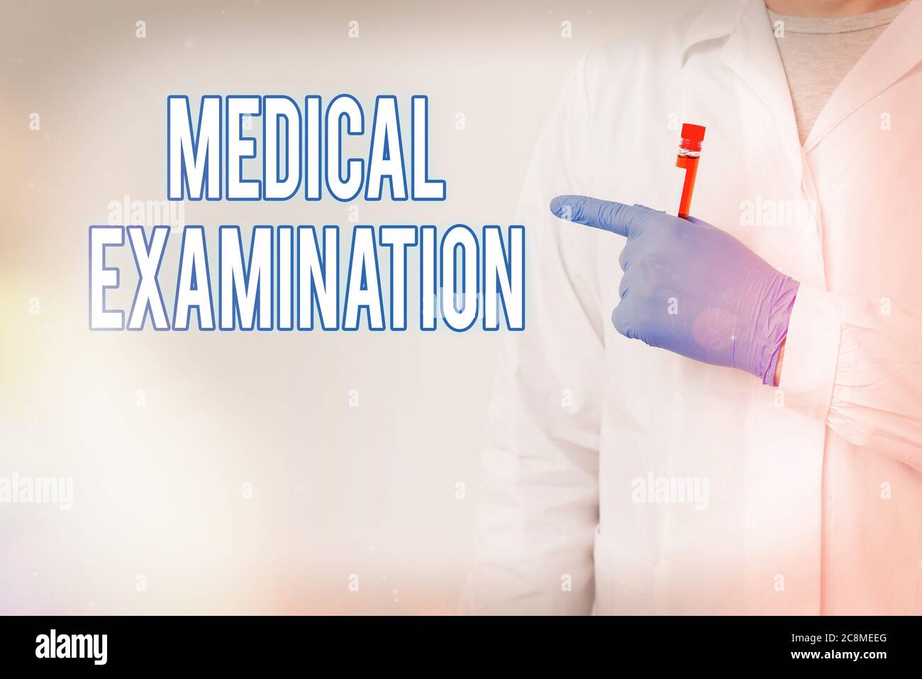 Writing note showing Medical Examination. Business concept for the ...