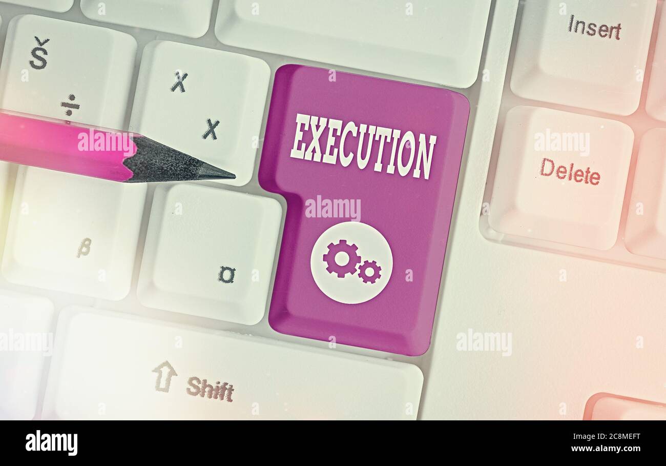 Writing note showing Execution. Business concept for the carrying out ...