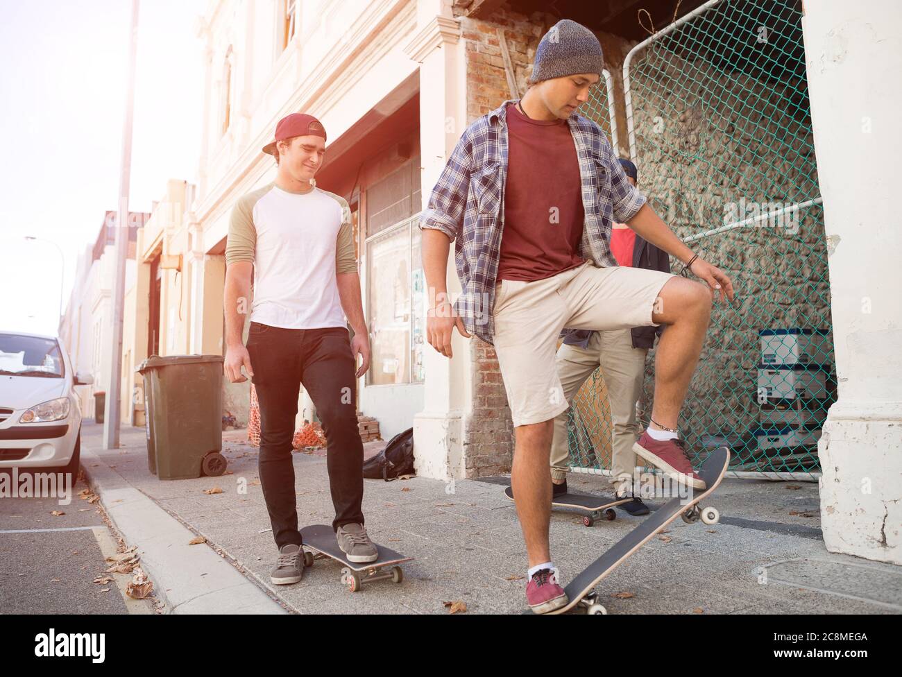 Three guys walking together in hi-res stock photography and images - Alamy