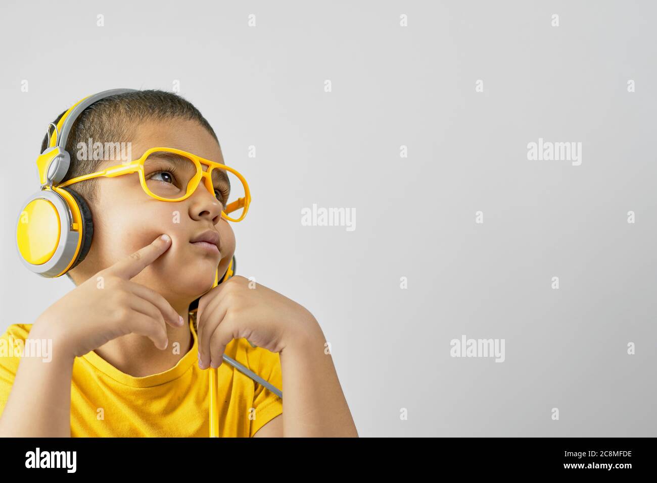 Thoughtful schoolboy having an idea. I know it. Primary school pupil ...
