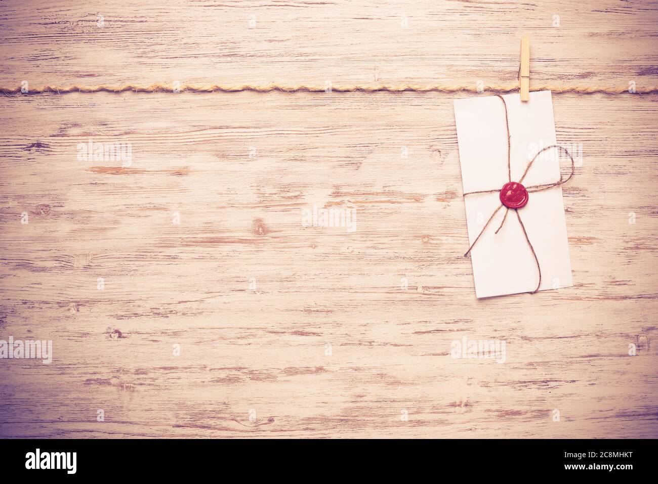 Mail envelope on rope Stock Photo - Alamy