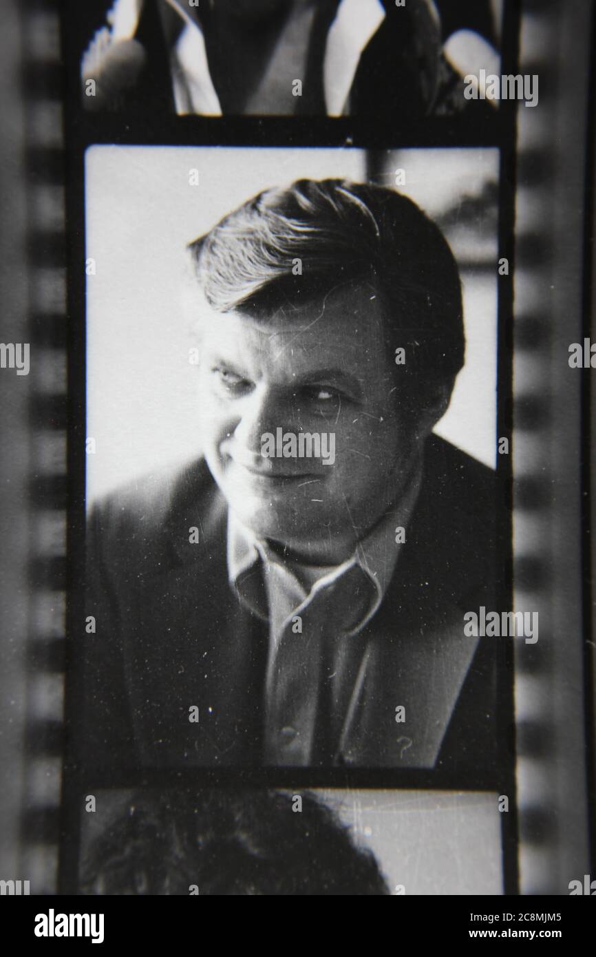 Fine 1970s vintage black and white photography of a smarmy man looking ...