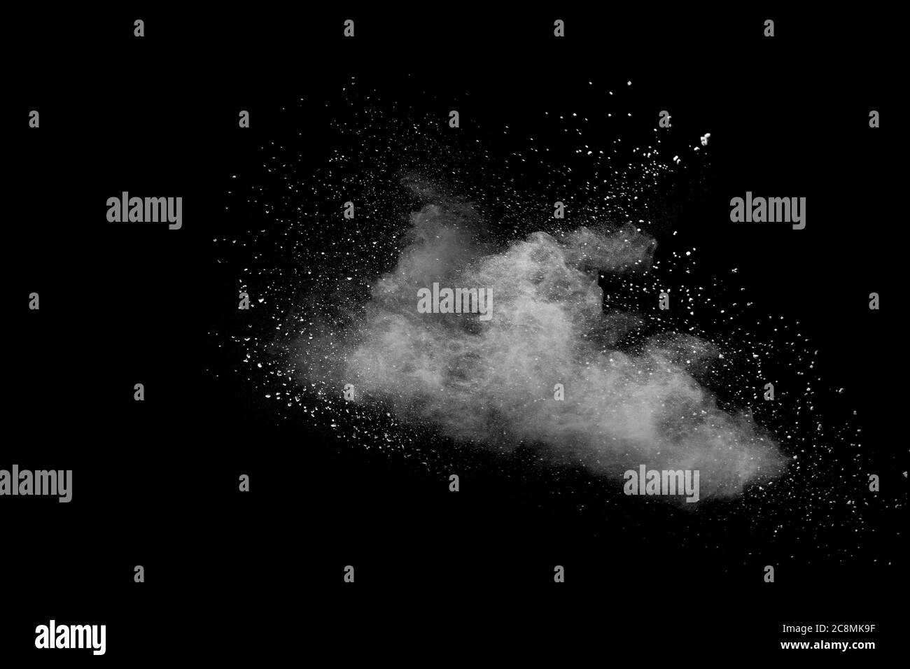 White talcume powder explosion on black background. White dust ...