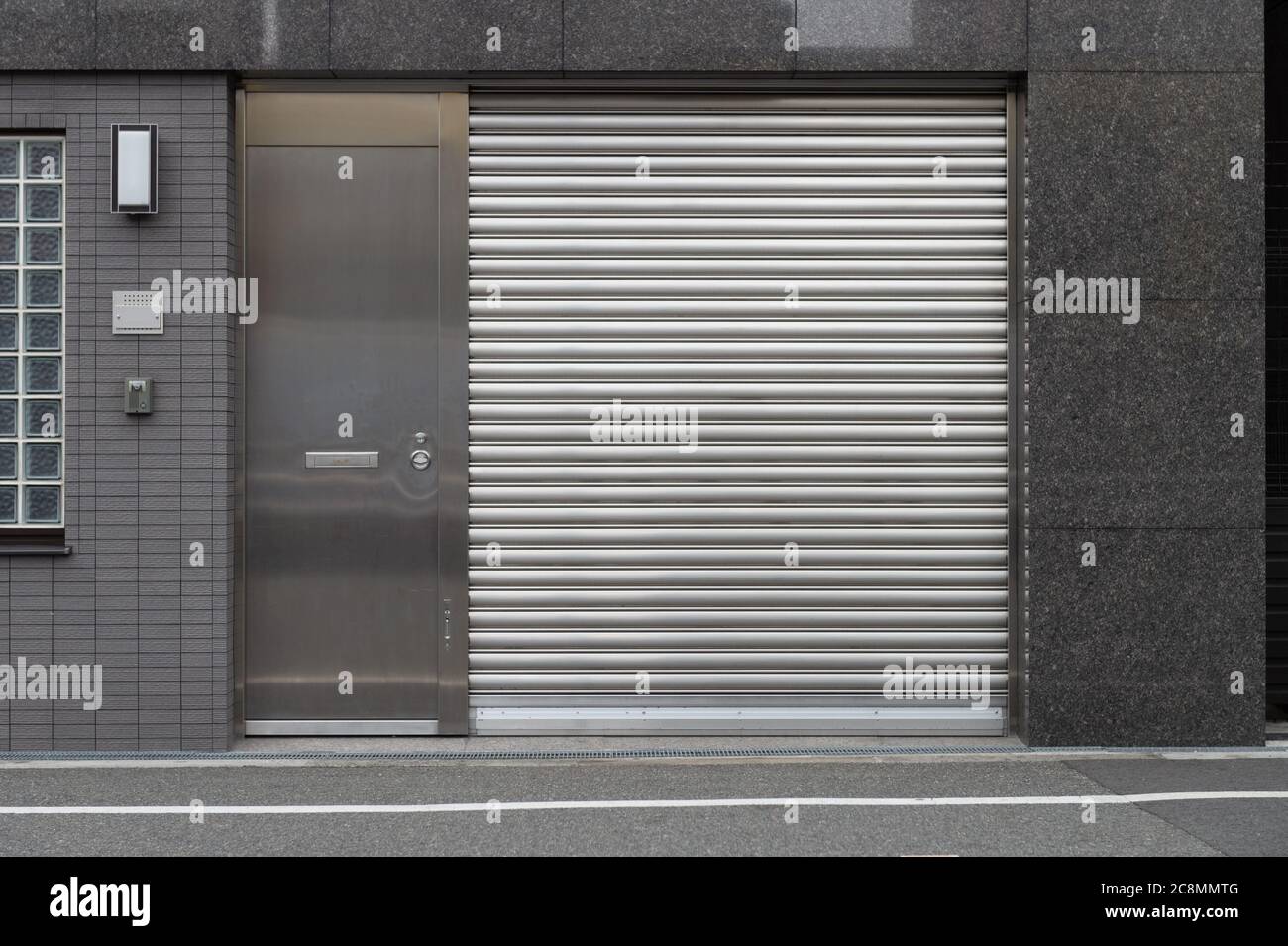 sidewalk by street wall & door Stock Photo - Alamy