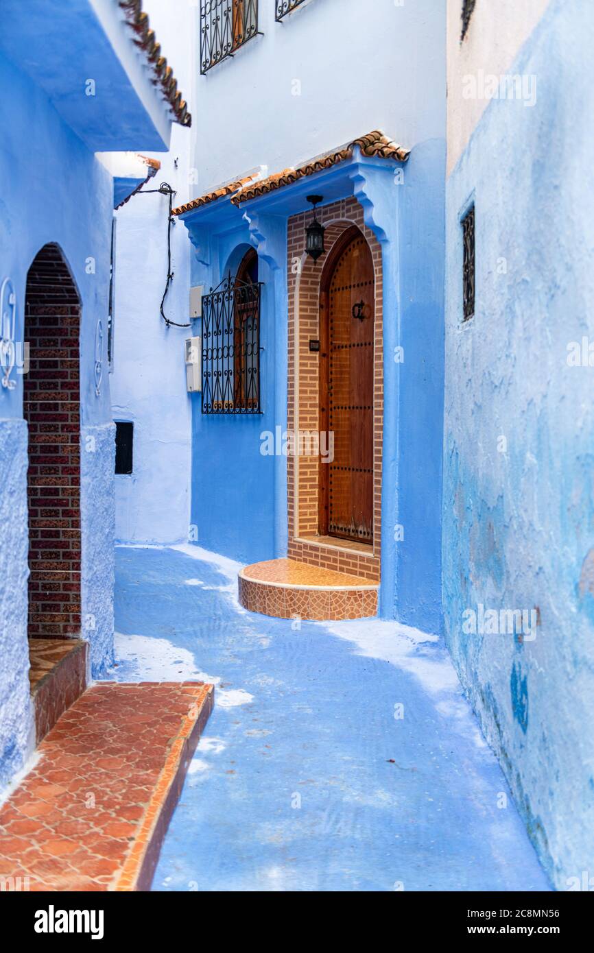 Blue-tinted buildings predominate in the city of Chefchaouen, Morocco ...