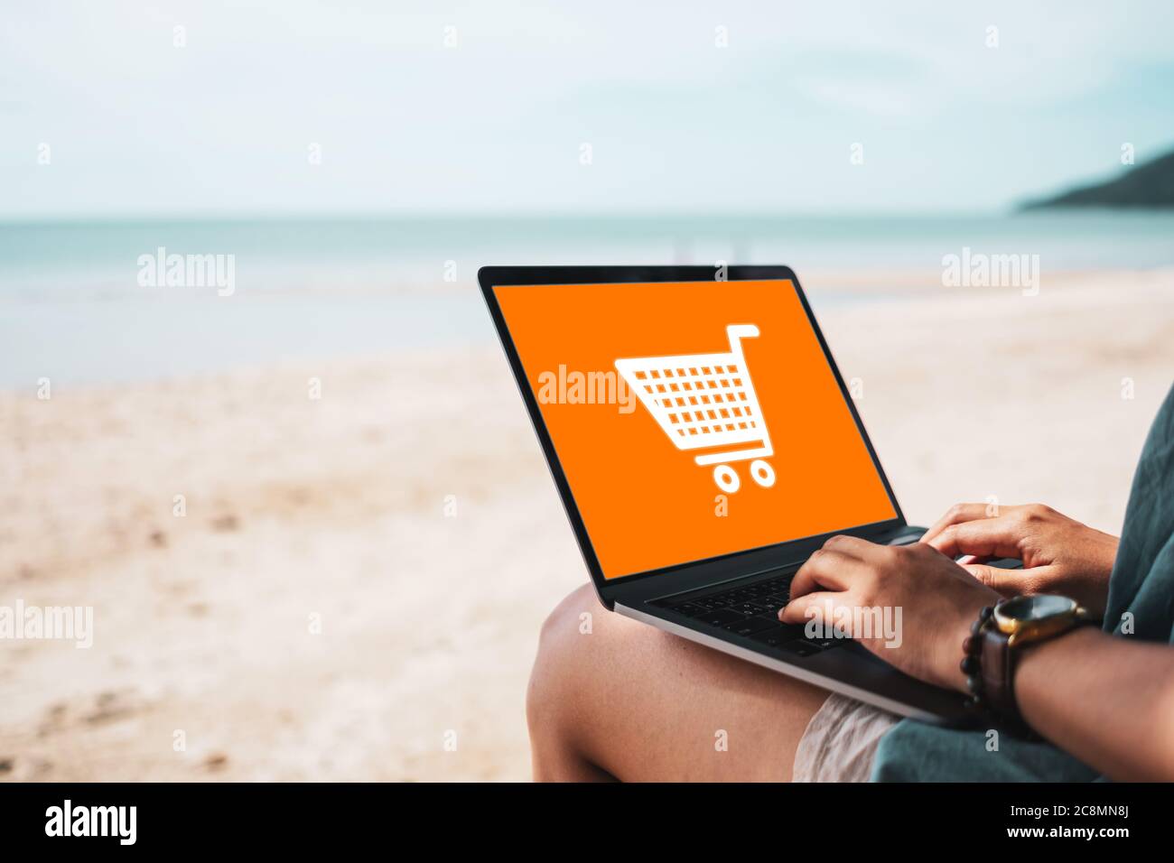 Women hand using computer shopping online with cart, dollar icons on ...