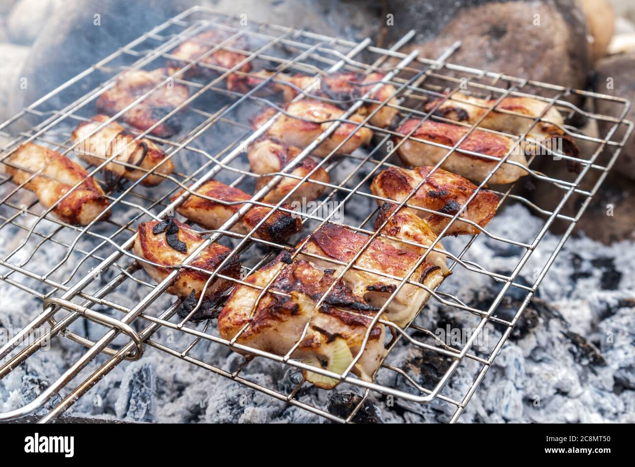 Cooked over fire hi-res stock photography and images - Alamy