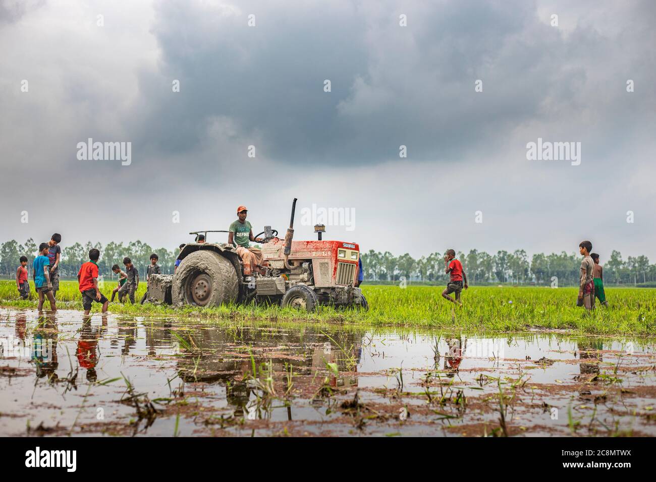 Traditional & modern Process in soil cultivations Stock Photo - Alamy