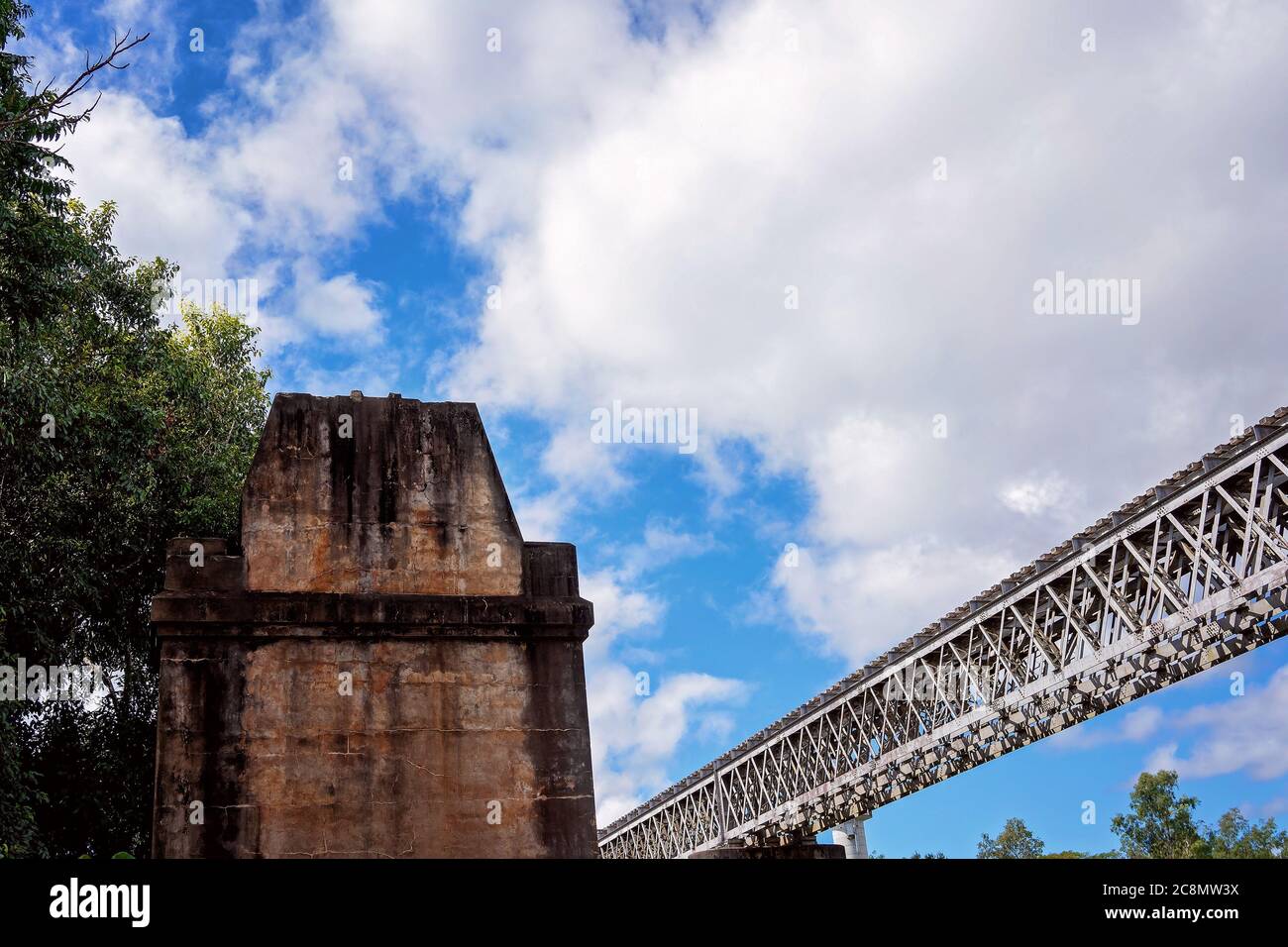 Concrete pylon part of an old railway bridge no longer used left ...