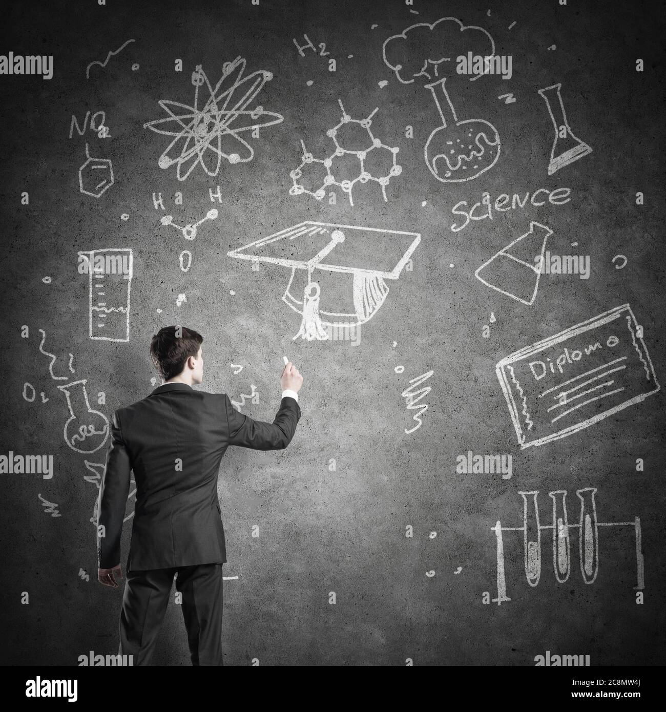 Man draw on chalkboard Stock Photo - Alamy