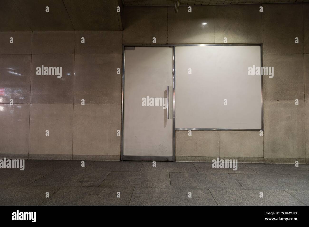 sidewalk by street wall & door Stock Photo - Alamy