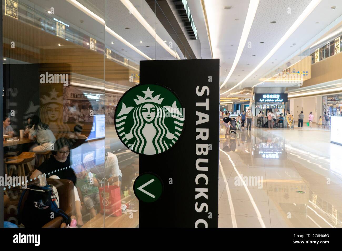 Customers in a Starbucks coffee shop Stock Photo - Alamy