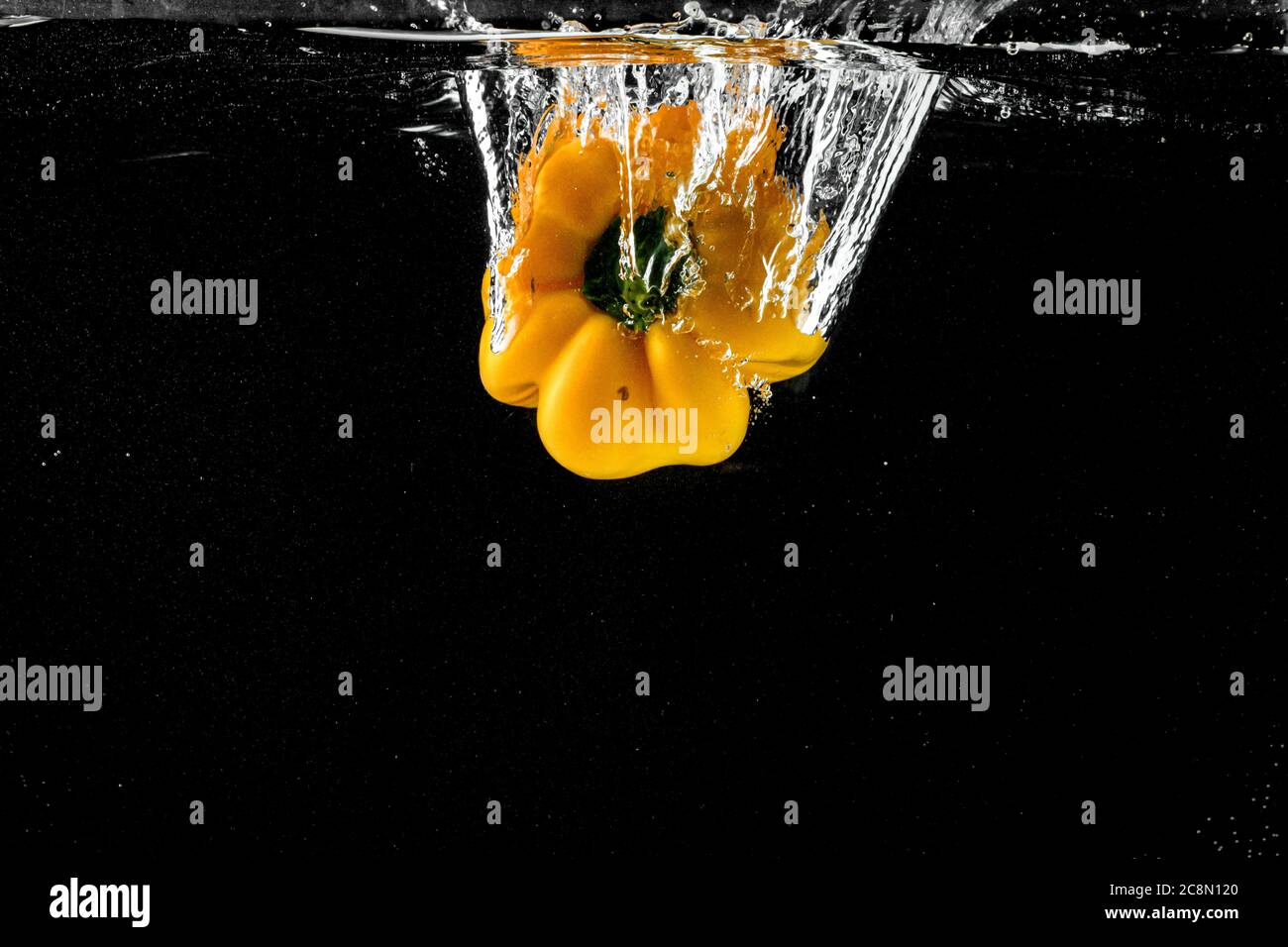 Three multi-colored bell peppers Stock Photo - Alamy
