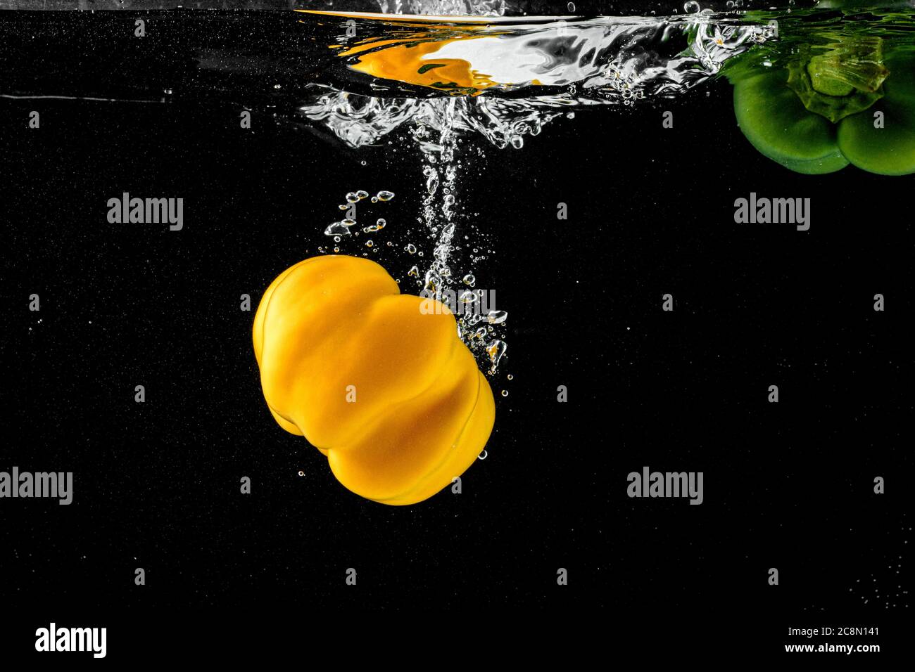Three multi-colored bell peppers Stock Photo - Alamy