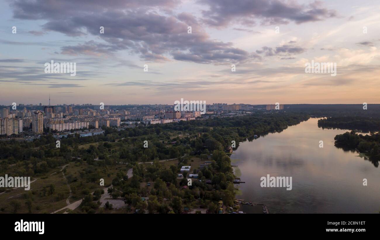 Aerial view of Kiev city with river and forest during sunset Ukraine ...