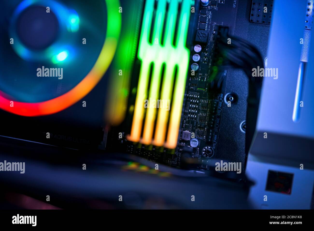 Close up of a computer motherboard, RGB memory and RGB CPU fan Stock ...