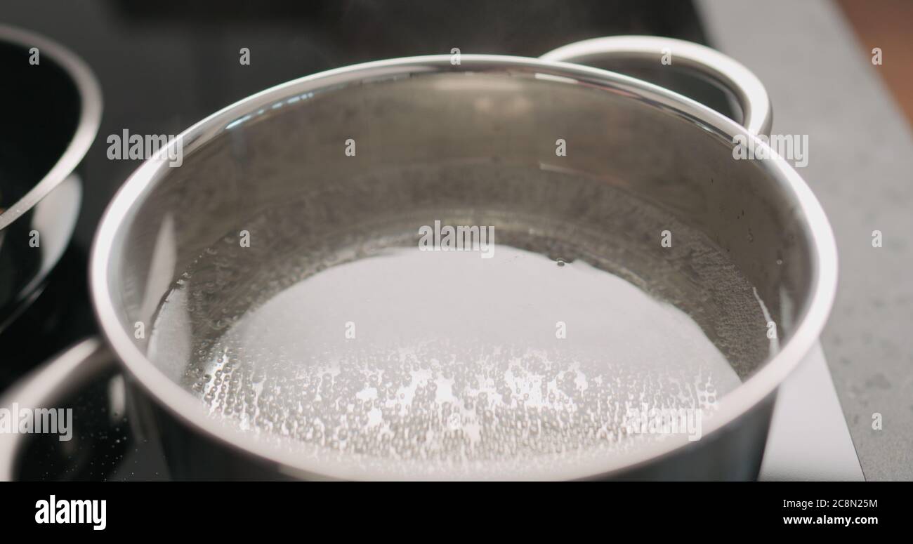 Boiling water bubbles in pot hi-res stock photography and images - Alamy