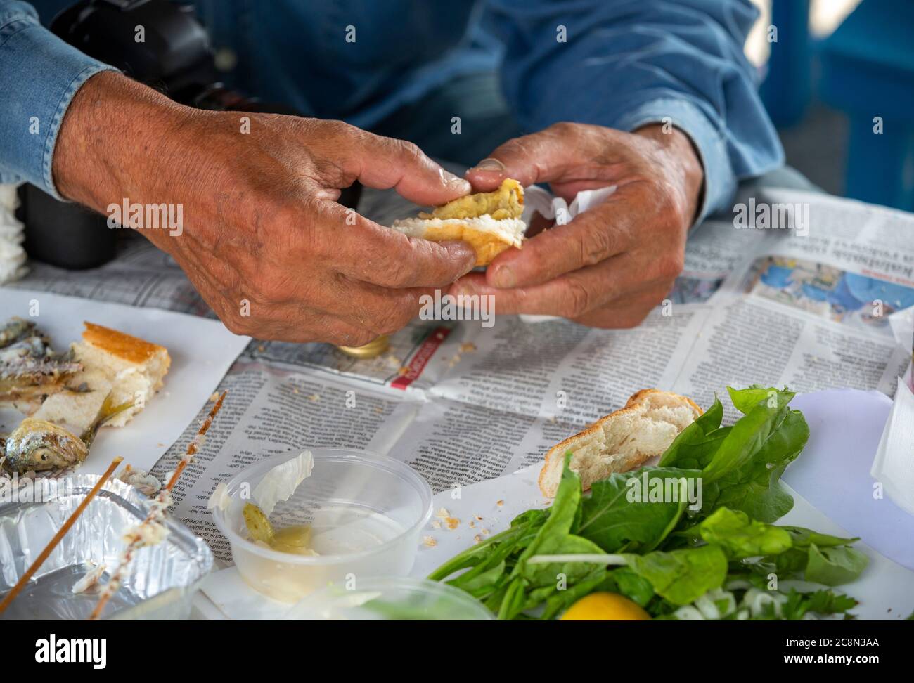 Man eating fish hi-res stock photography and images - Alamy