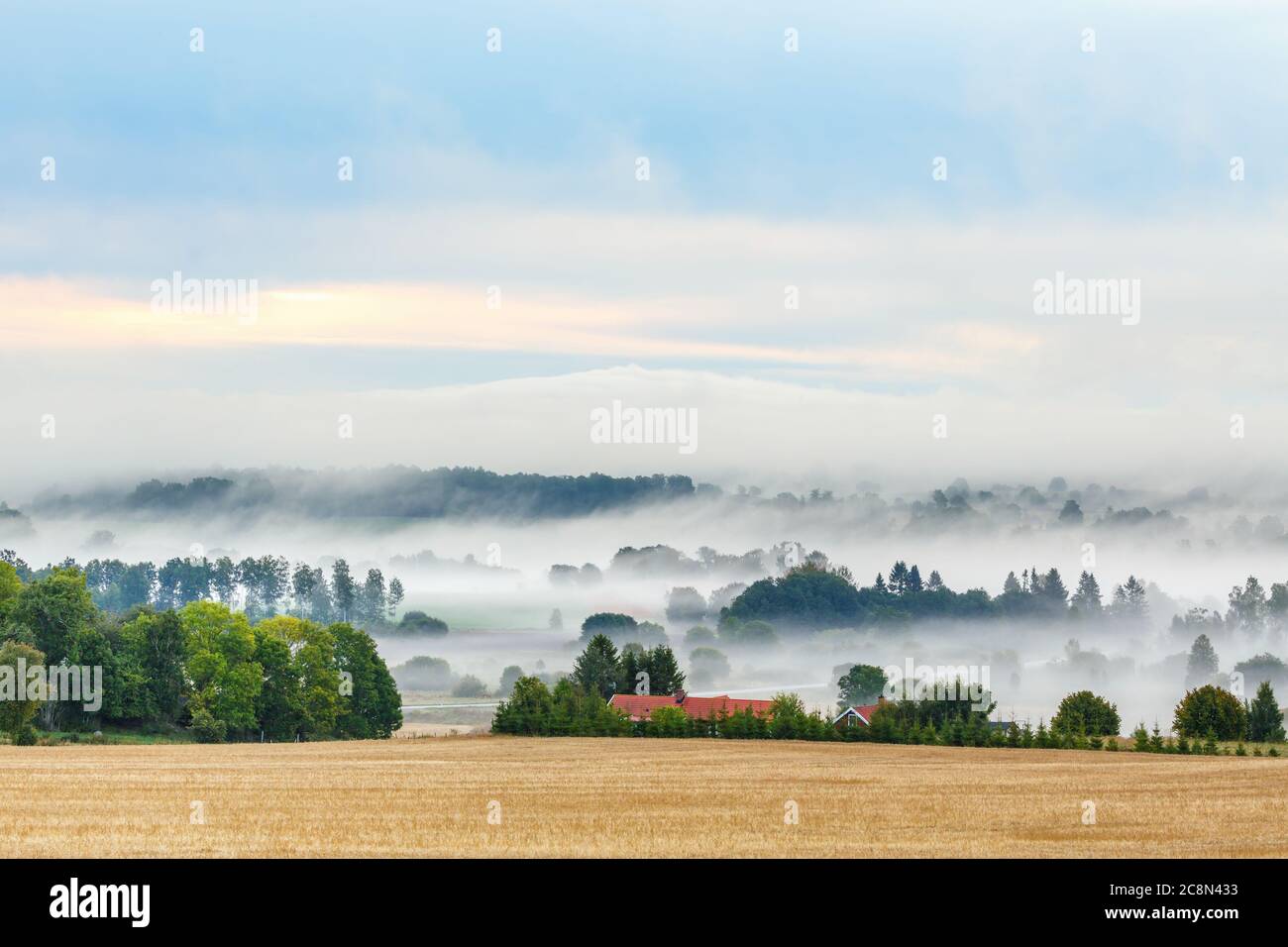 Countryside landscape view with morning fog Stock Photo - Alamy