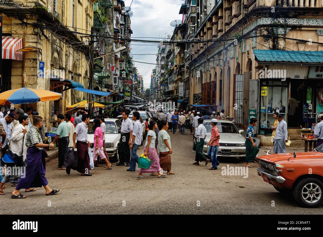 The busy bustling crowded streets of central Yangon in Myanmar ...