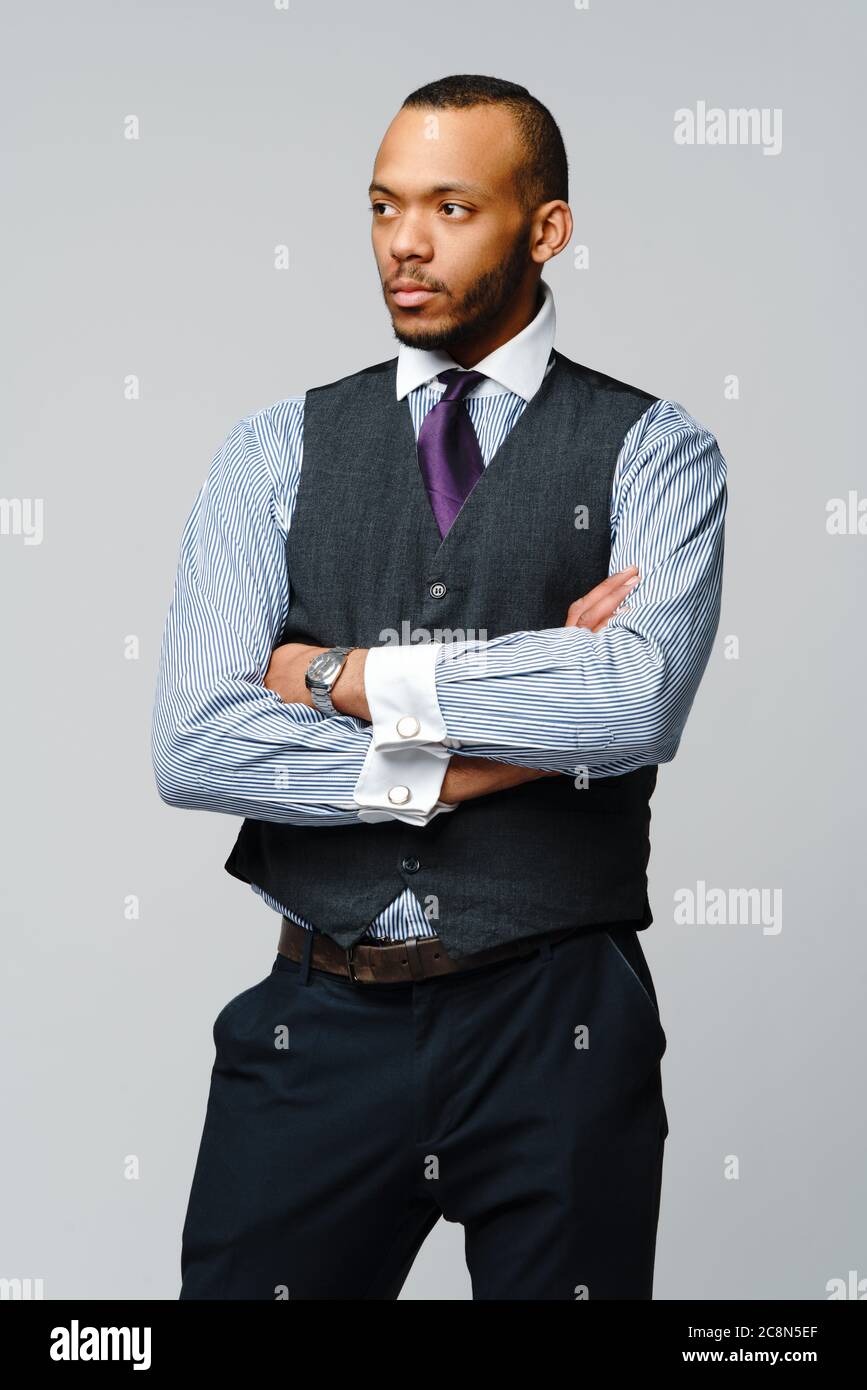 African-American man face portrait over grey background Stock Photo - Alamy