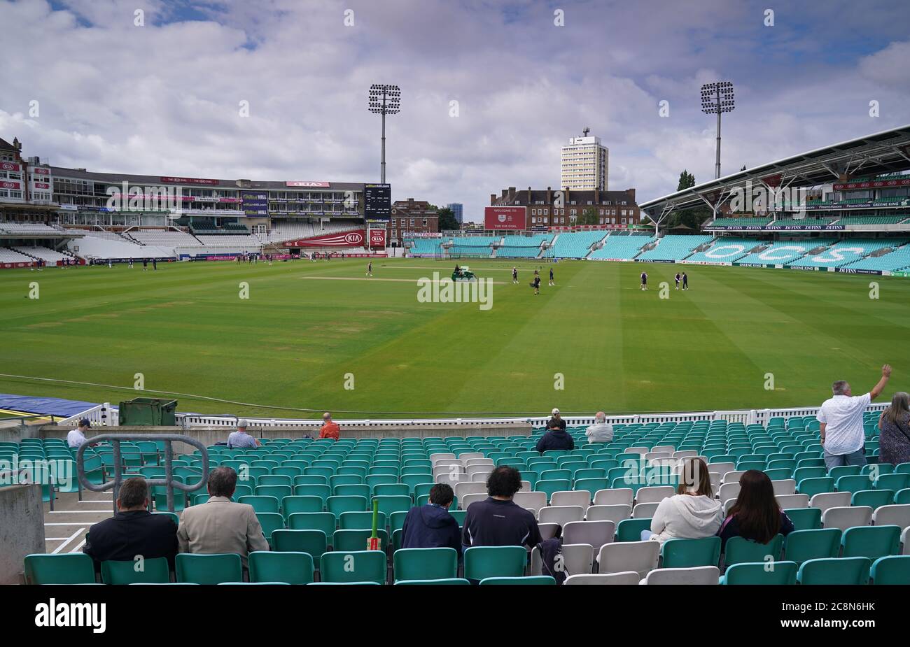 Spectators take their seats before the friendly match at the Kia Oval ...
