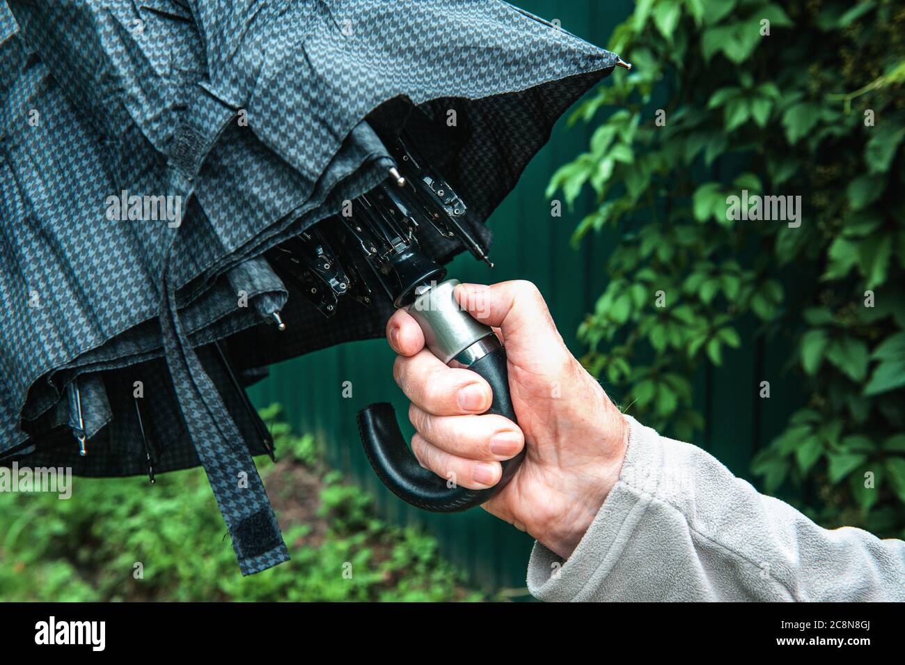 Wet rain old elderly senior hi-res stock photography and images - Alamy