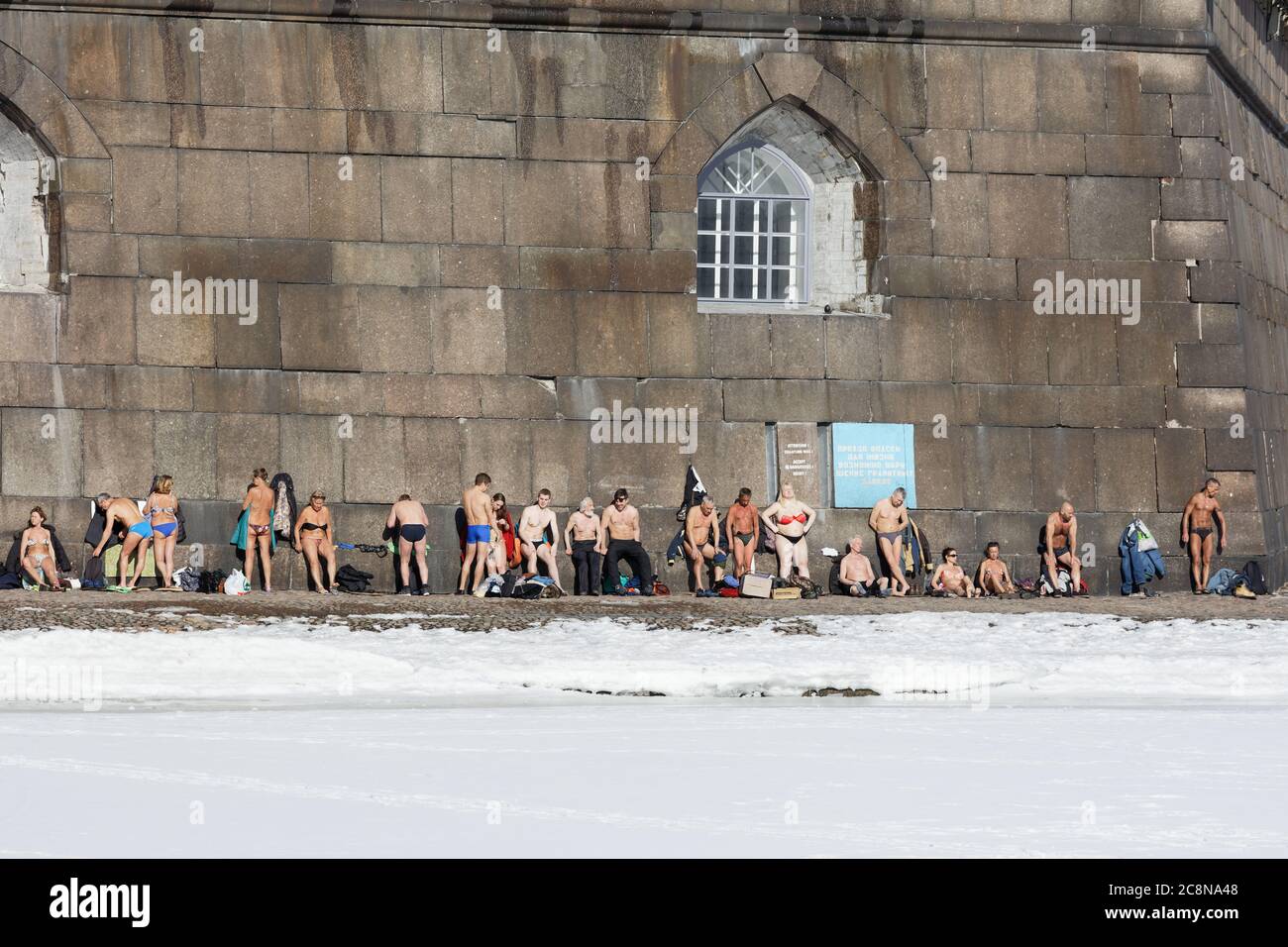 People sun bathing at the walls of St. Peter and Paul fortress, St ...