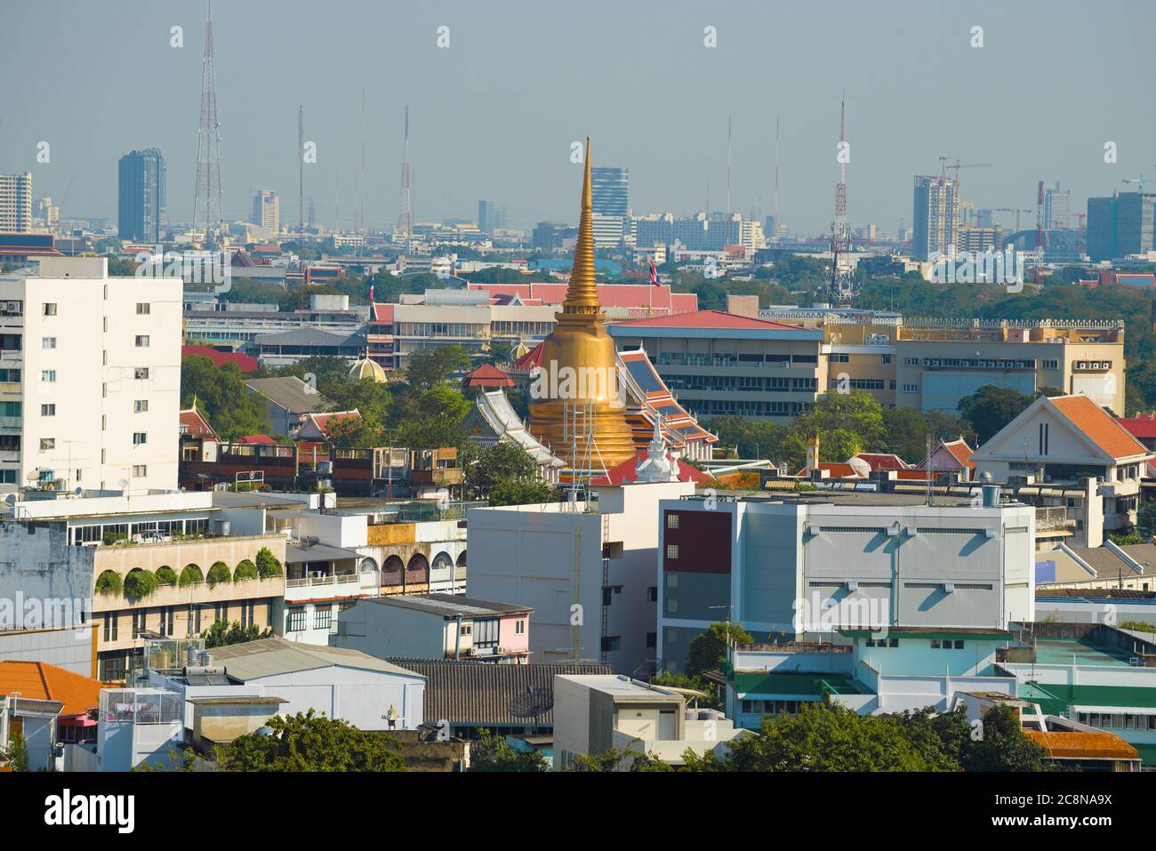 Stupa of a Buddhist temple in the landscape of modern Bangkok. Thailand ...