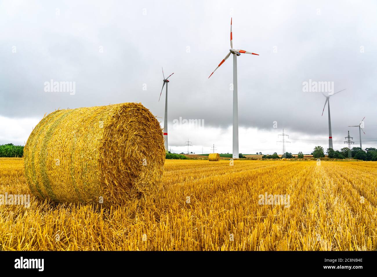 Power lines, high-voltage lines, wind power plants, grain field ...