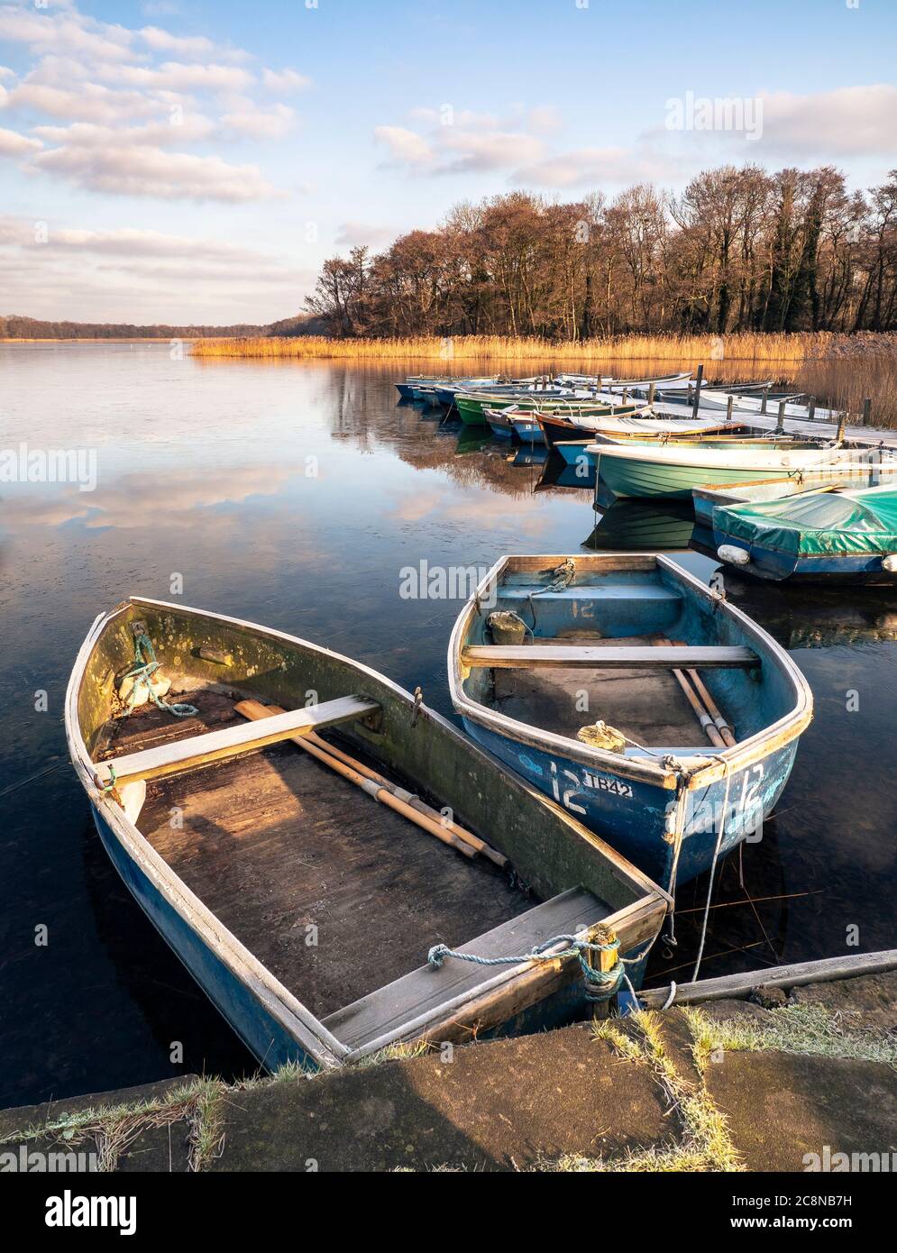 Rowing boats at Filby Broad on a cold winters morning Stock Photo - Alamy