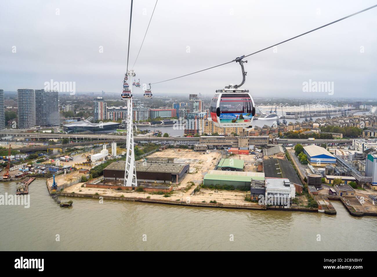 View from The Emirates Air Line cable car approaching Royal Docks. Line ...