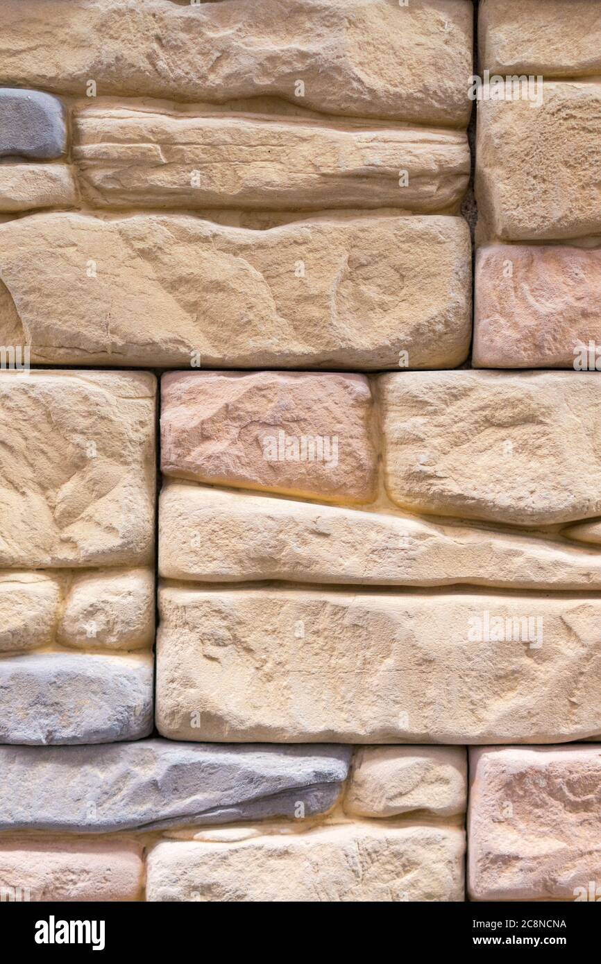 Stacked stone wall, natural stone cladding. Stone wall for background ...