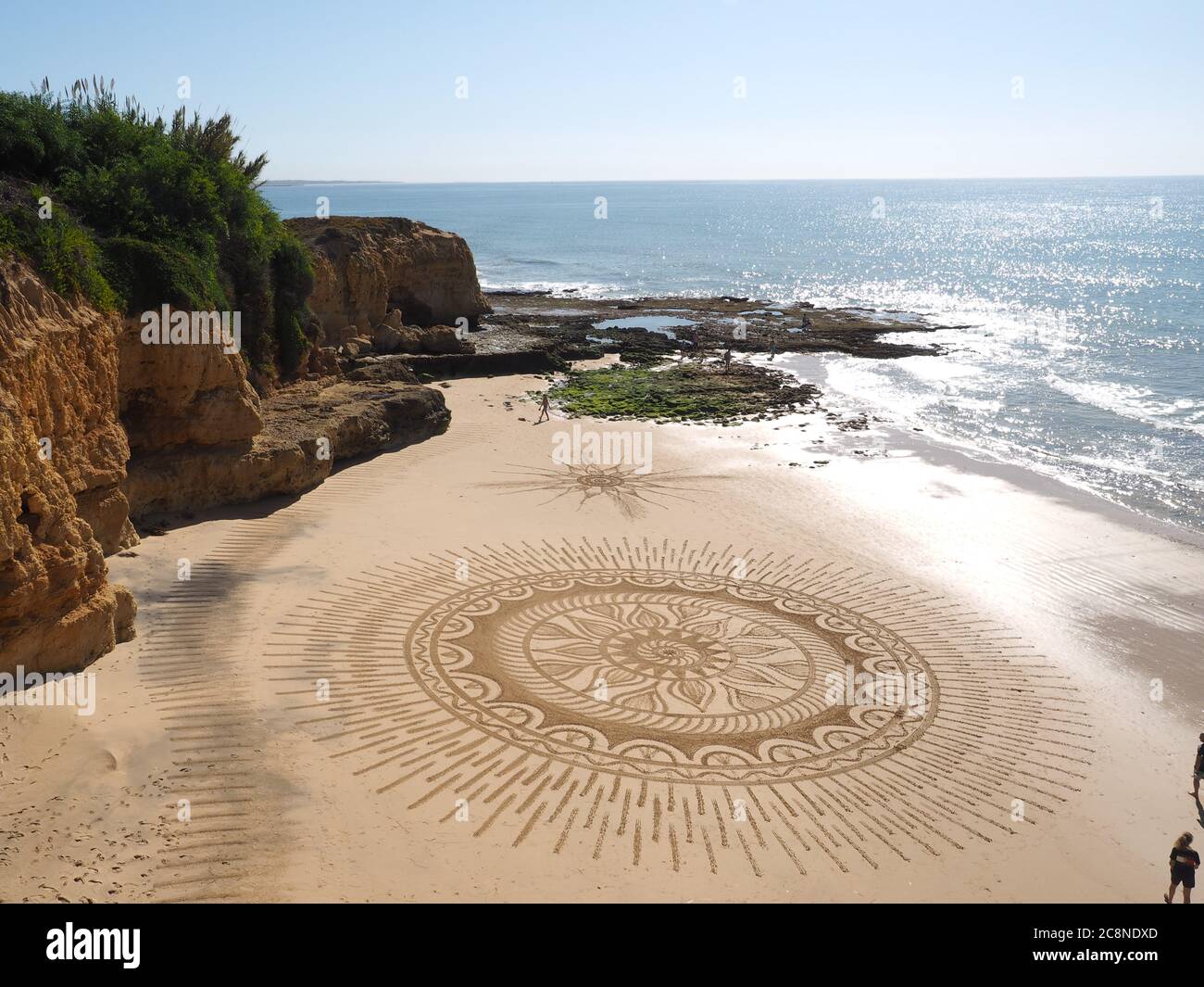Sand artist Vitor Raposo presents his art at the Algarve beach Praia ...