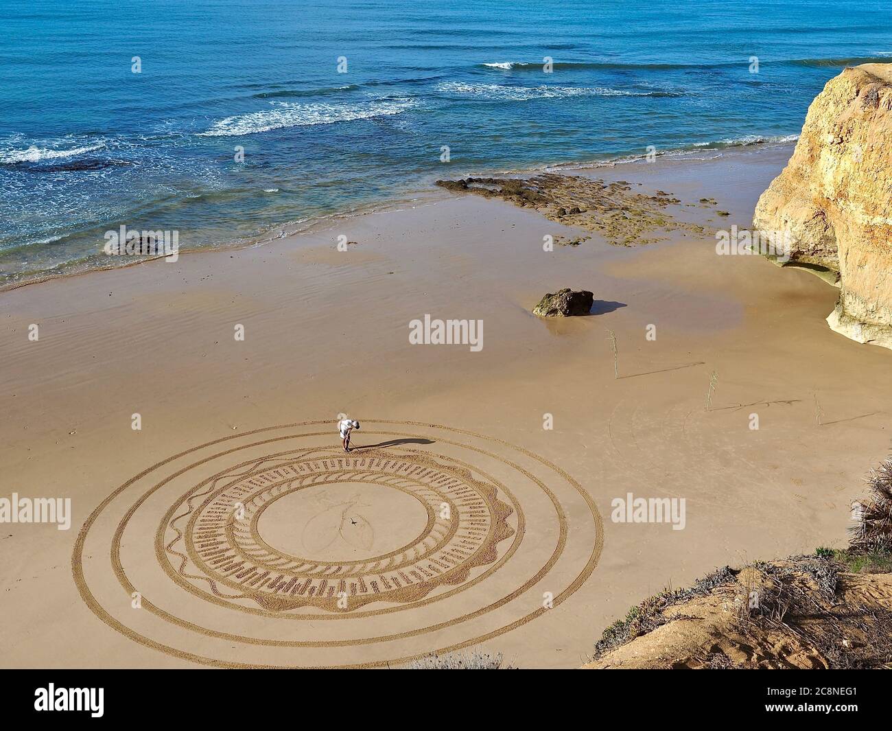 Sand artist Vitor Raposo presents his art at the Algarve beach Praia ...