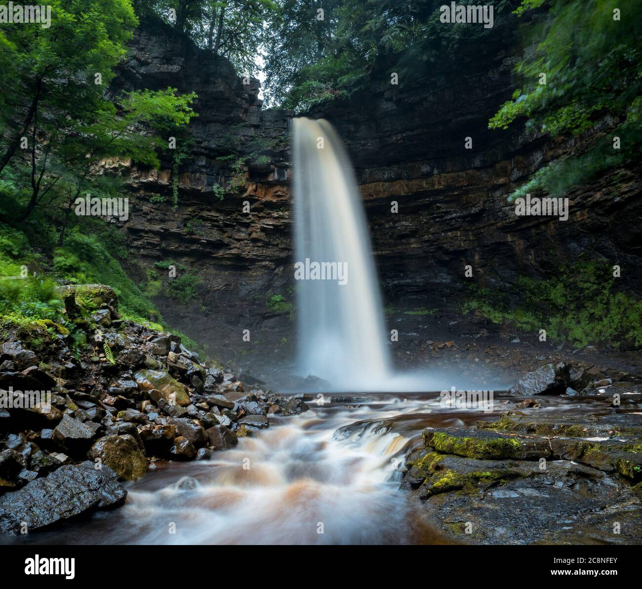 Water thundering over Hardraw Force waterfall after a heavy rain storm ...