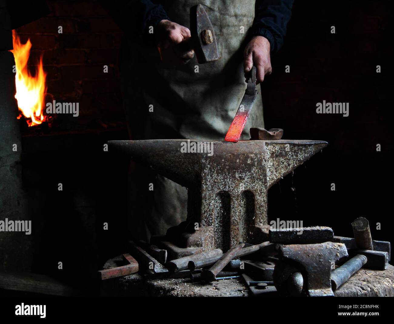 Black blacksmith hi-res stock photography and images - Alamy