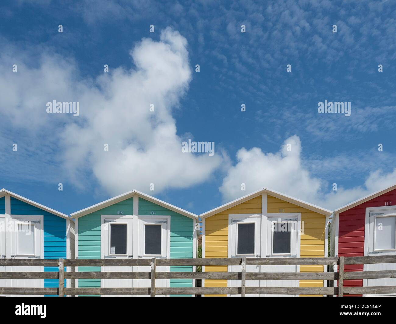 Beach huts in a row at Bude Cornwall Stock Photo - Alamy
