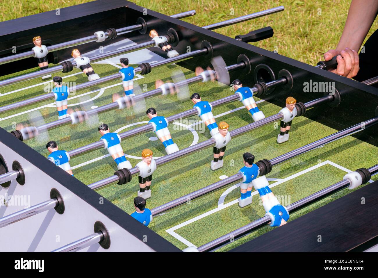 Children play table football in hi-res stock photography and images - Alamy